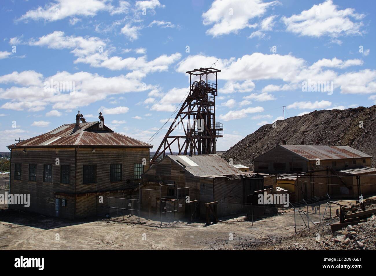 Disused Delprat Mine Buildings with Mine Shaft soaring into a Blue Sky ...
