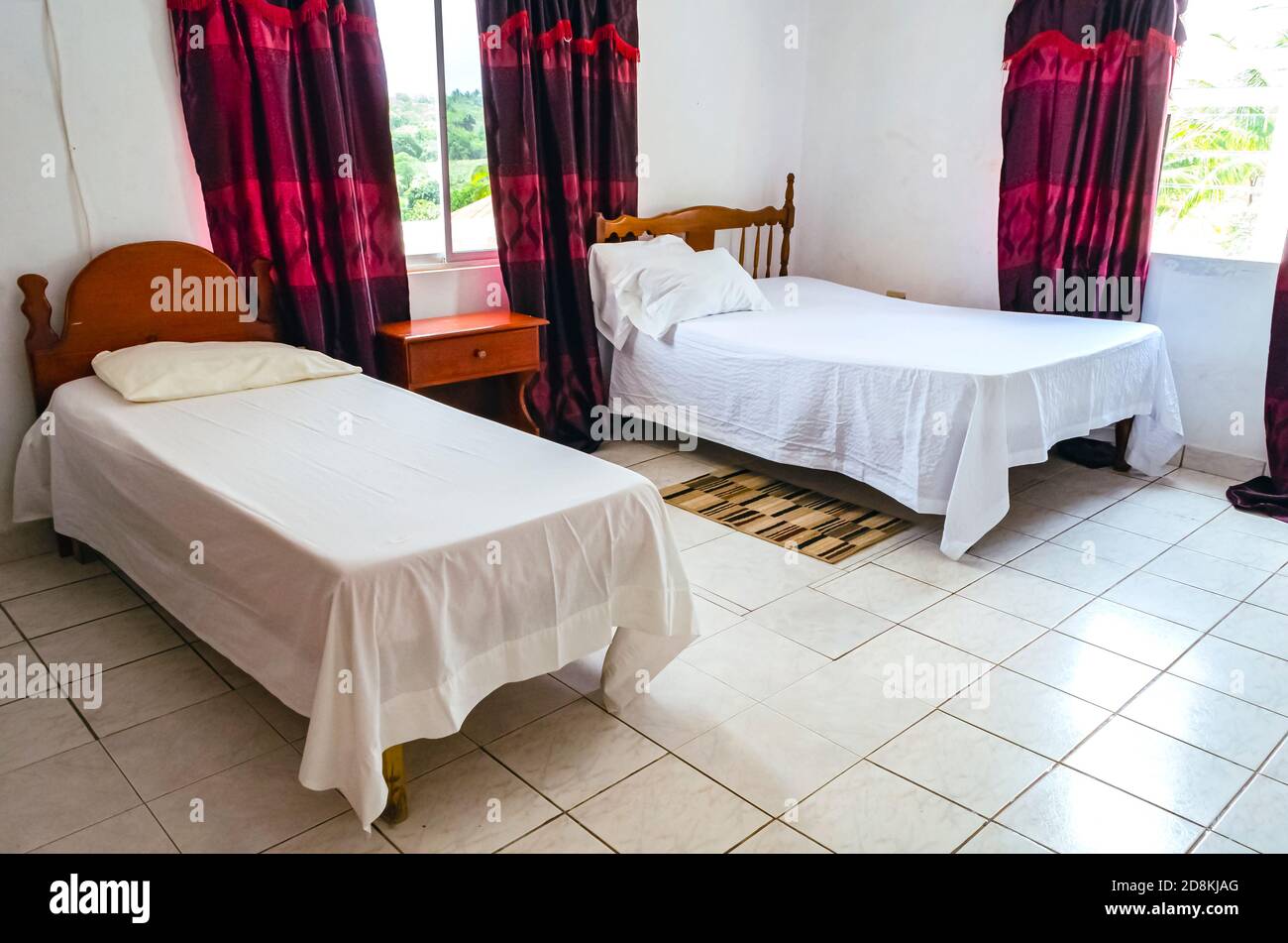 Two Bed In A Guest Room Stock Photo - Alamy