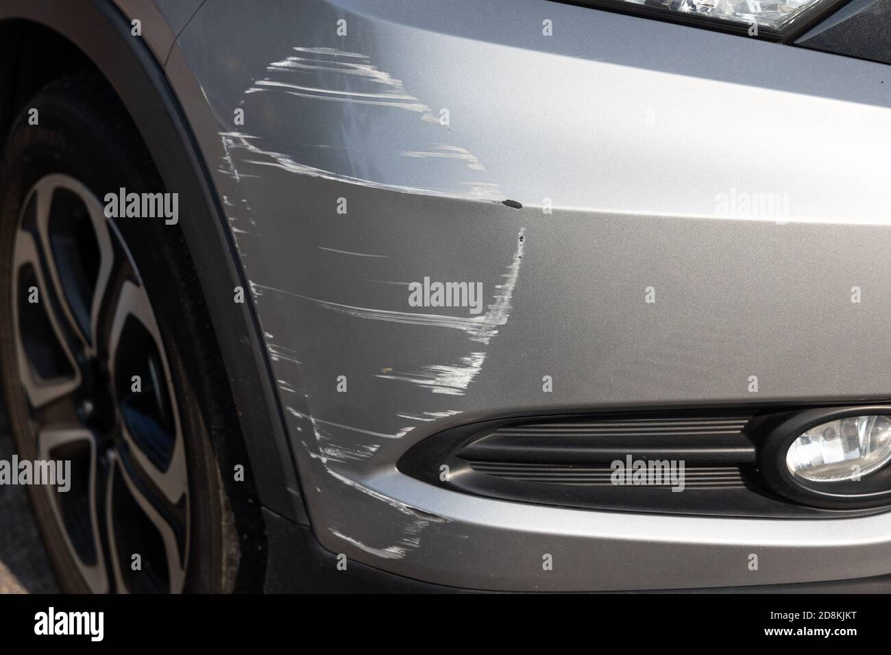 Scratch on car bumper due to minor accident Stock Photo - Alamy
