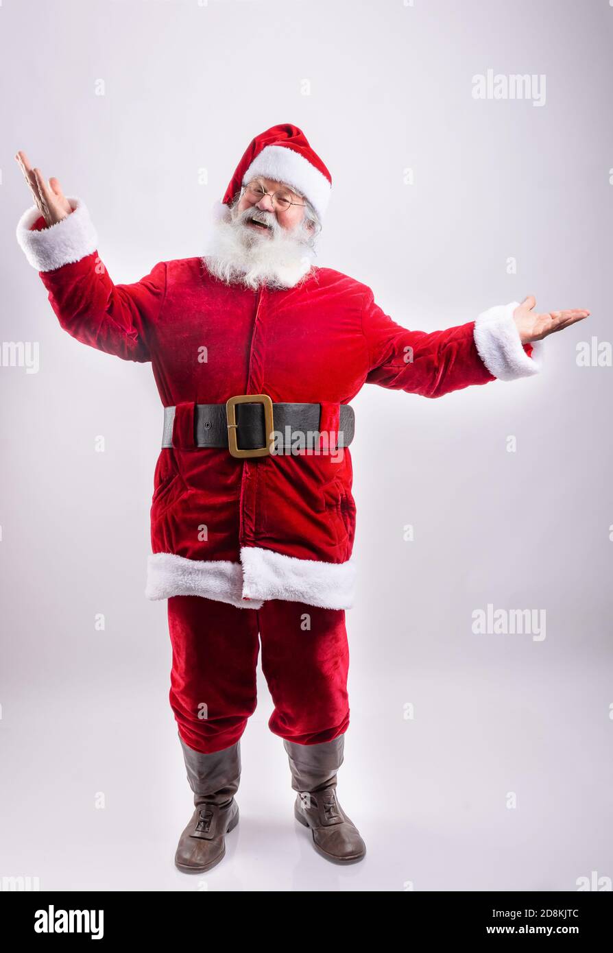 Happy Santa Claus, with arms wide open in white background Stock Photo ...