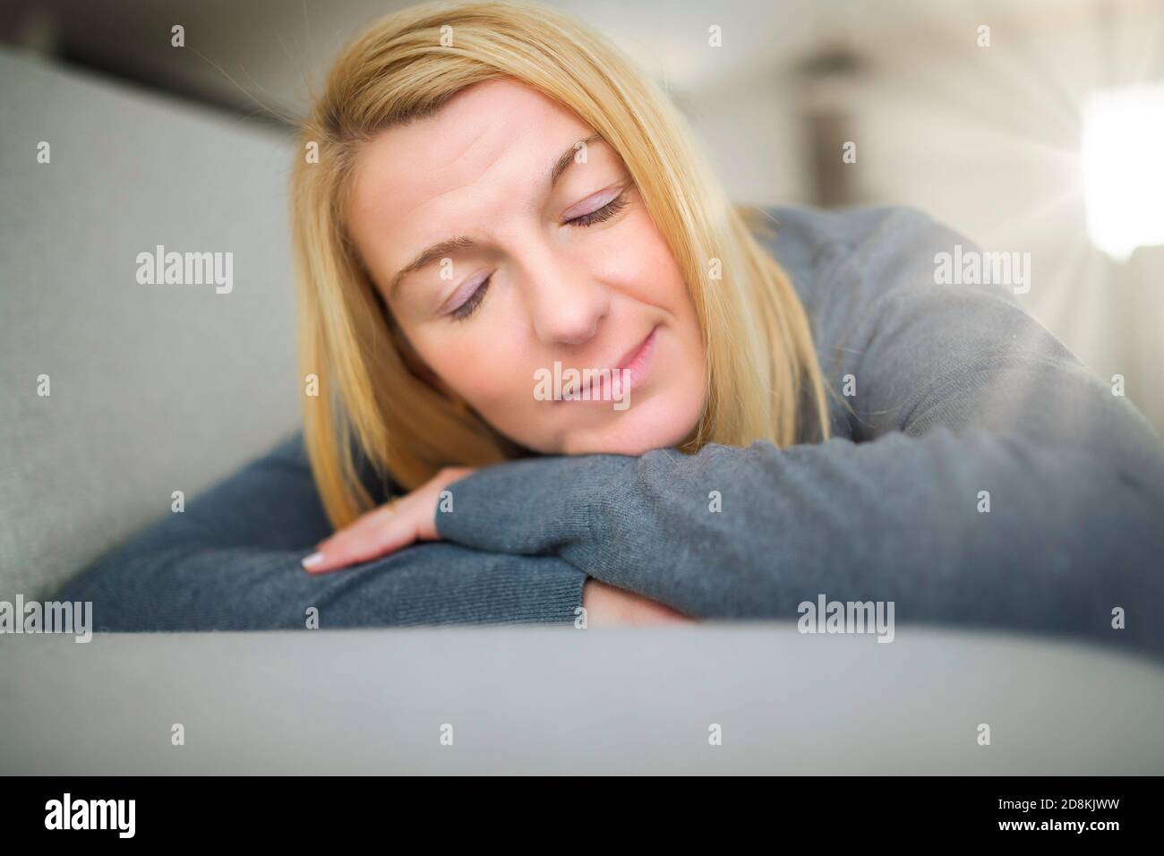 Tired person sofa hi-res stock photography and images - Alamy