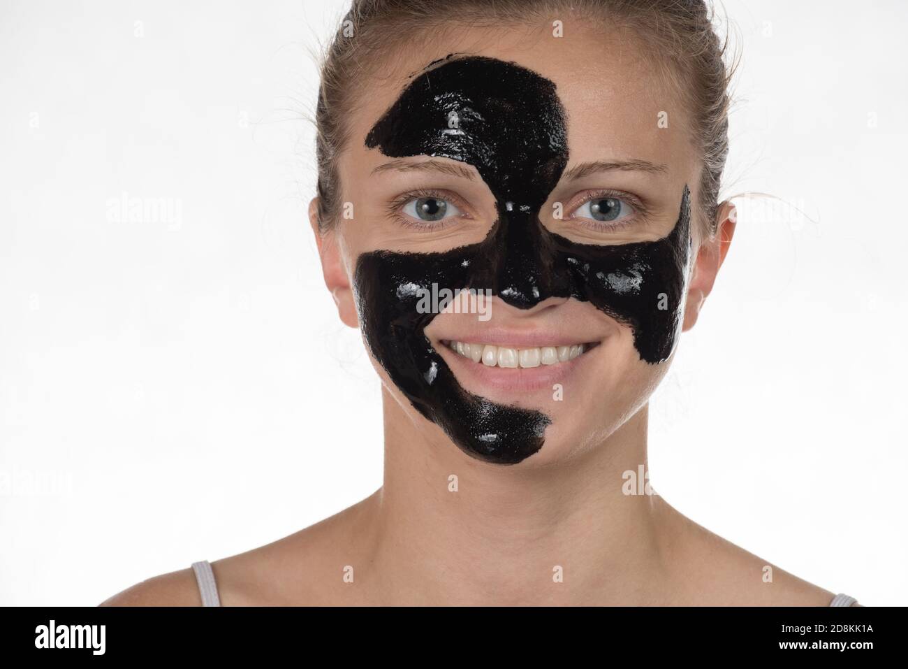 Happy beautiful girl with acne smiling on a white background in a ...