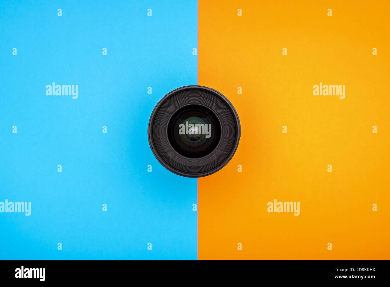 Top view of a lens on blue and orange background Stock Photo - Alamy