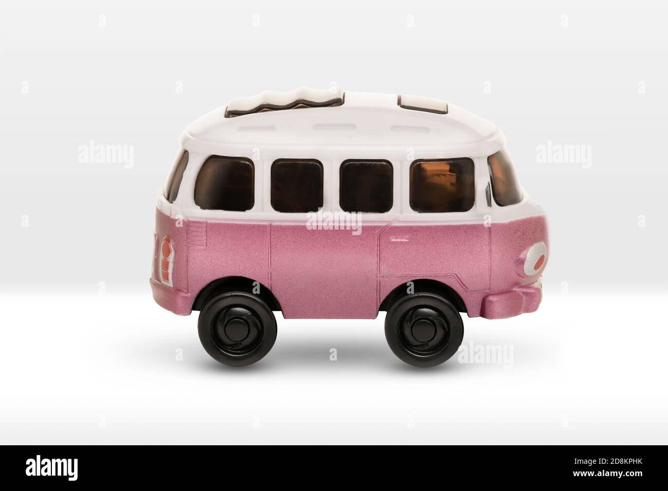 children's car minibus, pink with a white roof on a white background ...