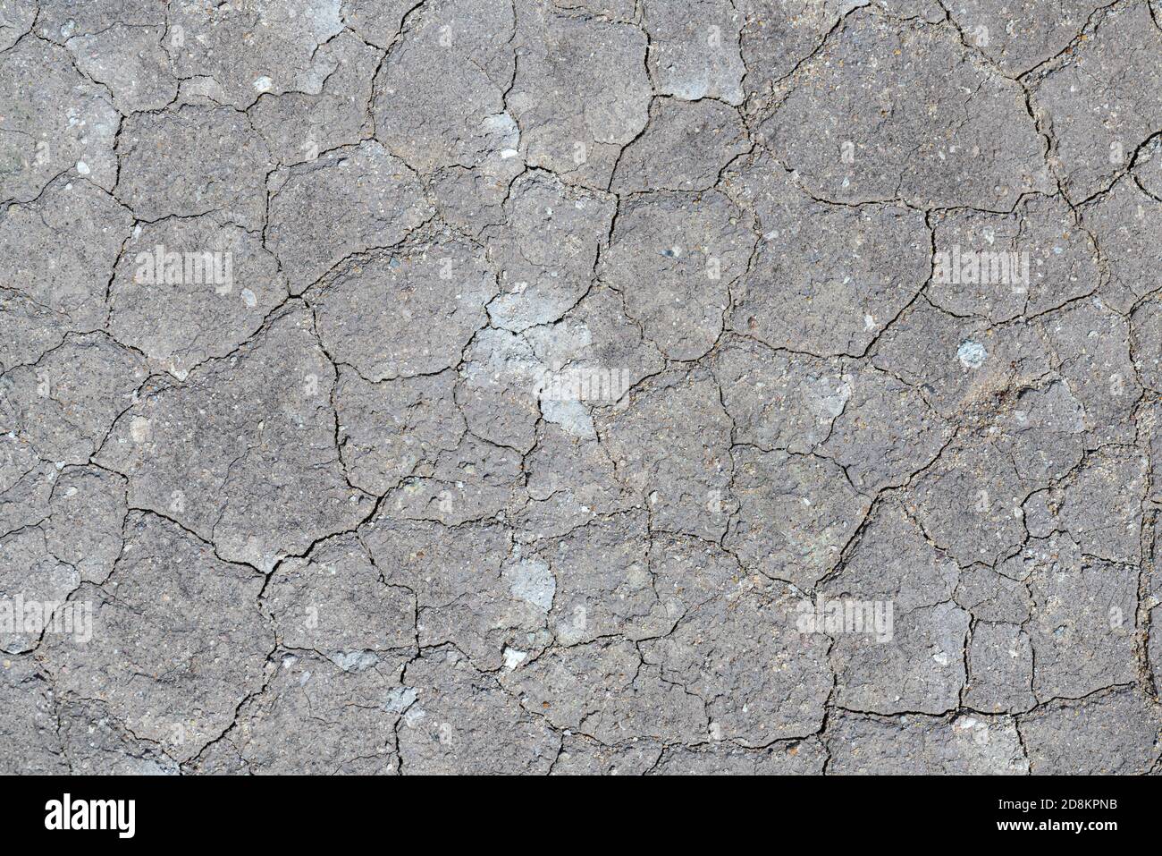 Dry cracked background of volcanic ground turned into desert. Natural ...