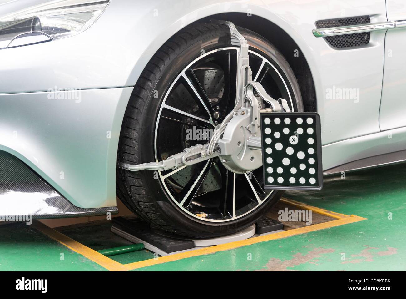 Car wheel clamp with wheel align device for wheel alignment Stock Photo ...