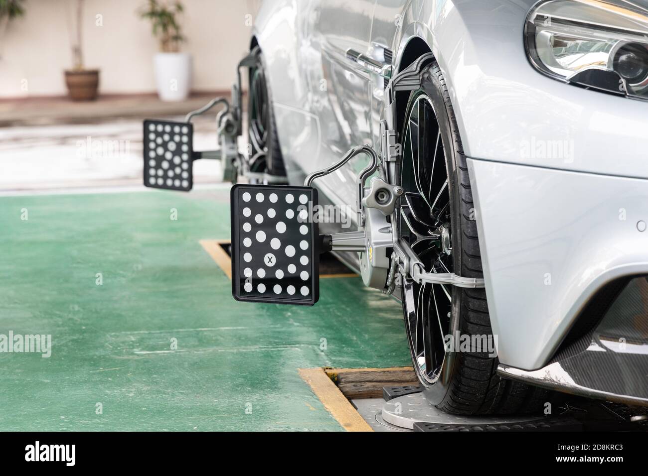 Car wheel clamp with wheel align device for wheel alignment Stock Photo ...