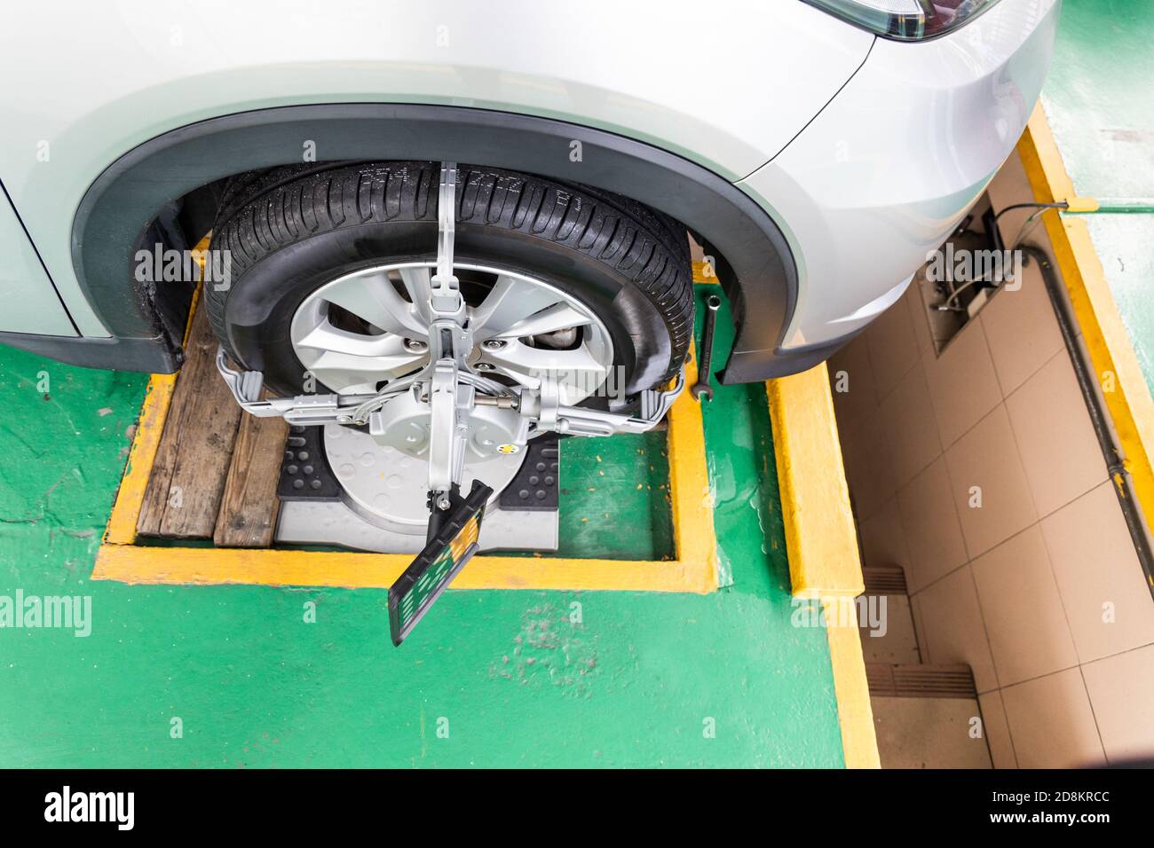 Car wheel clamp with wheel align device for wheel alignment Stock Photo ...