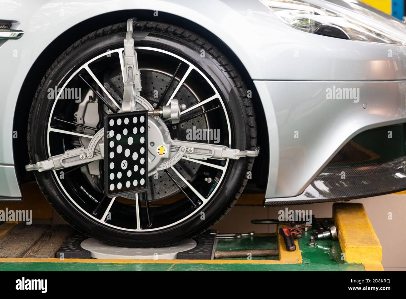 Car wheel clamp with wheel align device for wheel alignment Stock Photo ...
