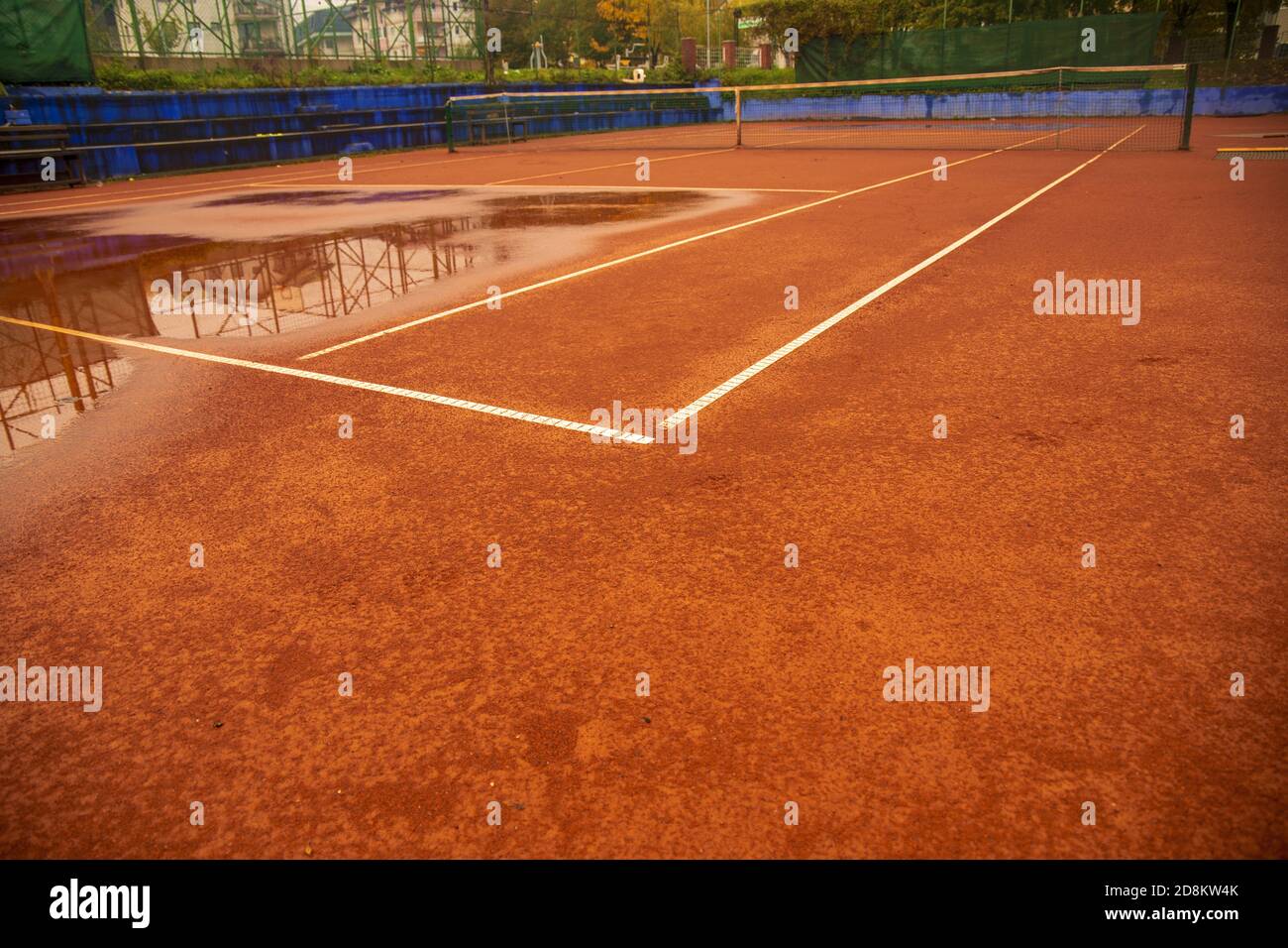 Outdoor tennis court on a rainy day Stock Photo - Alamy