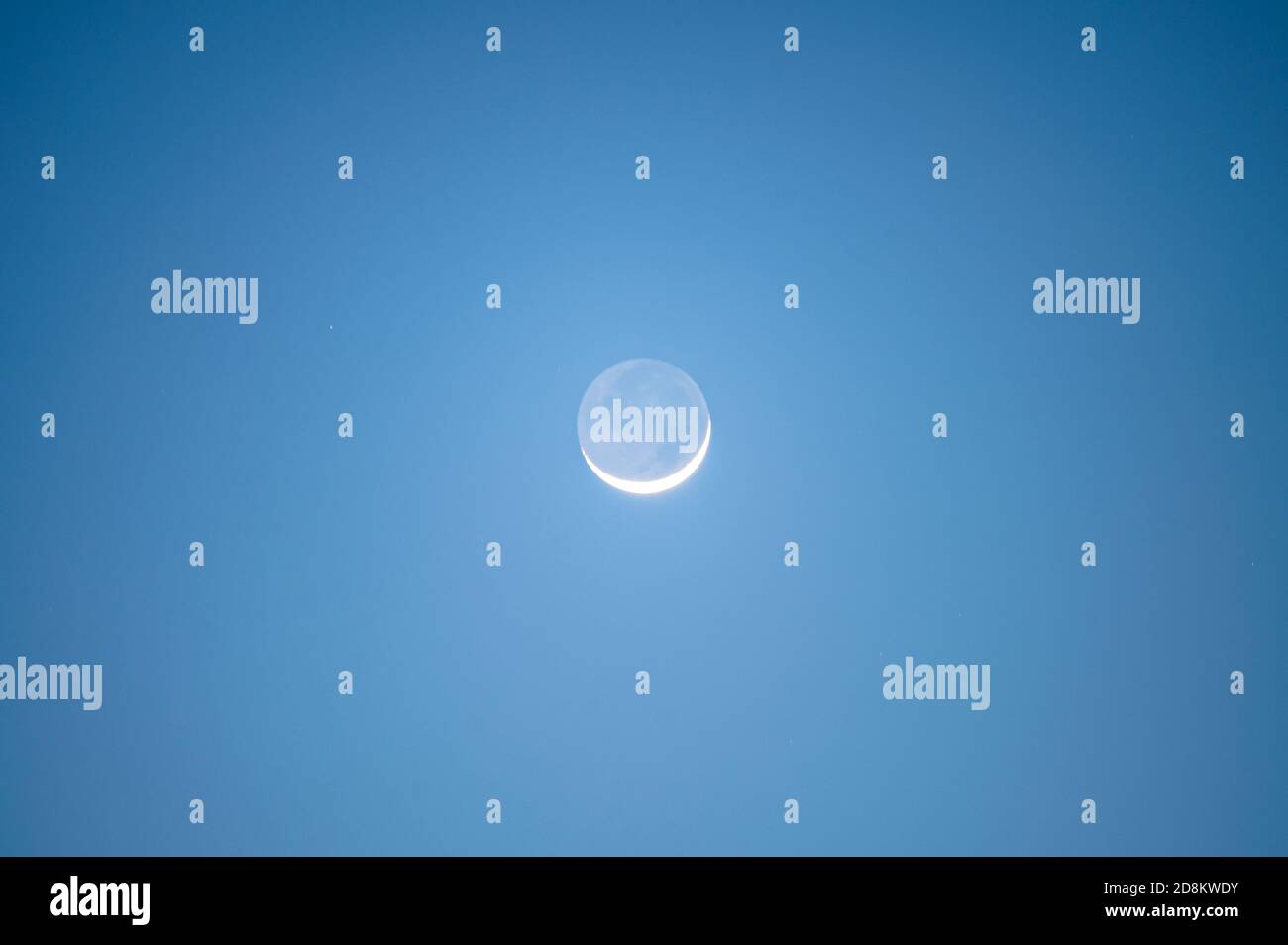 Crescent moon glowing in hi-res stock photography and images - Alamy