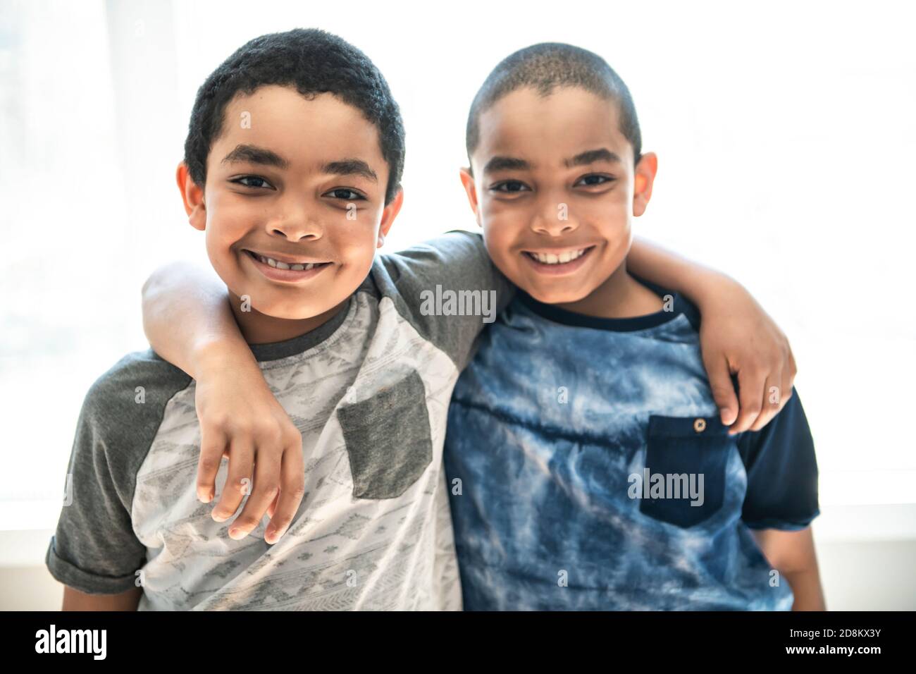 Portrait Of twin african american Brother at home Stock Photo - Alamy