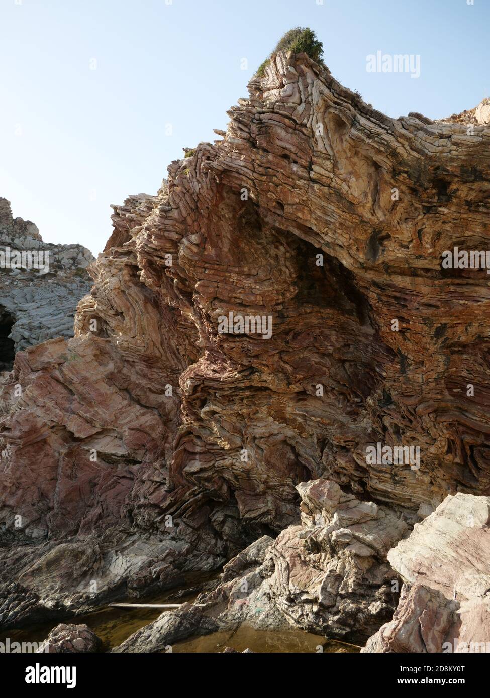Vertical shot of the huge cliffs captured in Crete, Greece during the ...