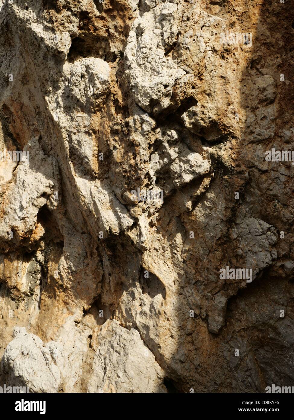 Vertical shot of the huge cliffs captured in Crete, Greece during the ...
