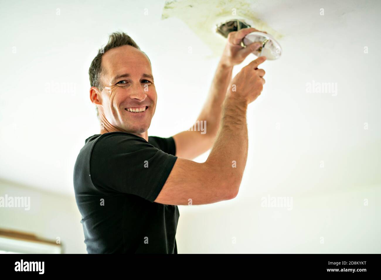 Installing electricity hi-res stock photography and images - Alamy