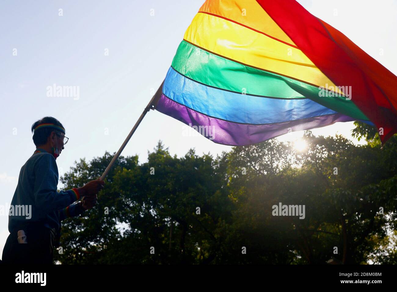 Taiwanese Lgbt Rights Activist Chi Chia Wei Waves A Rainbow Flag During