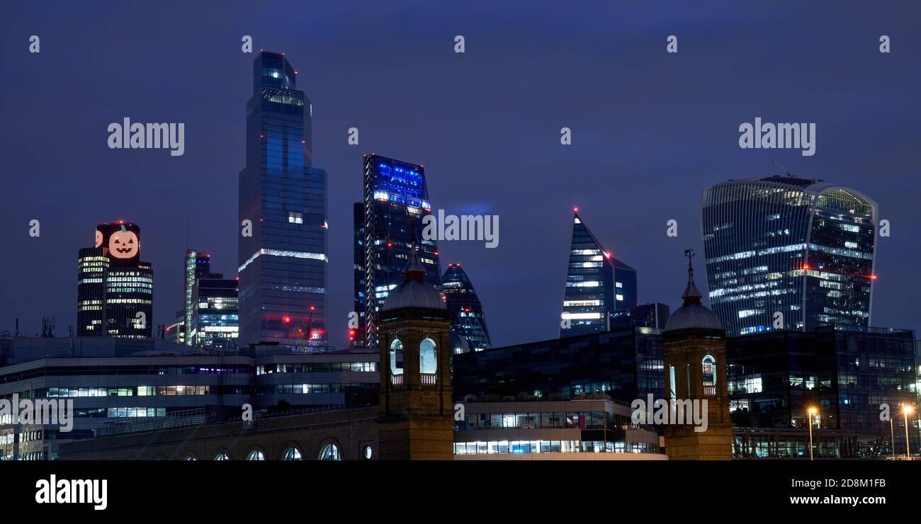 A pumpkin is illuminated onto the tower 42 skyscraper, London Stock ...