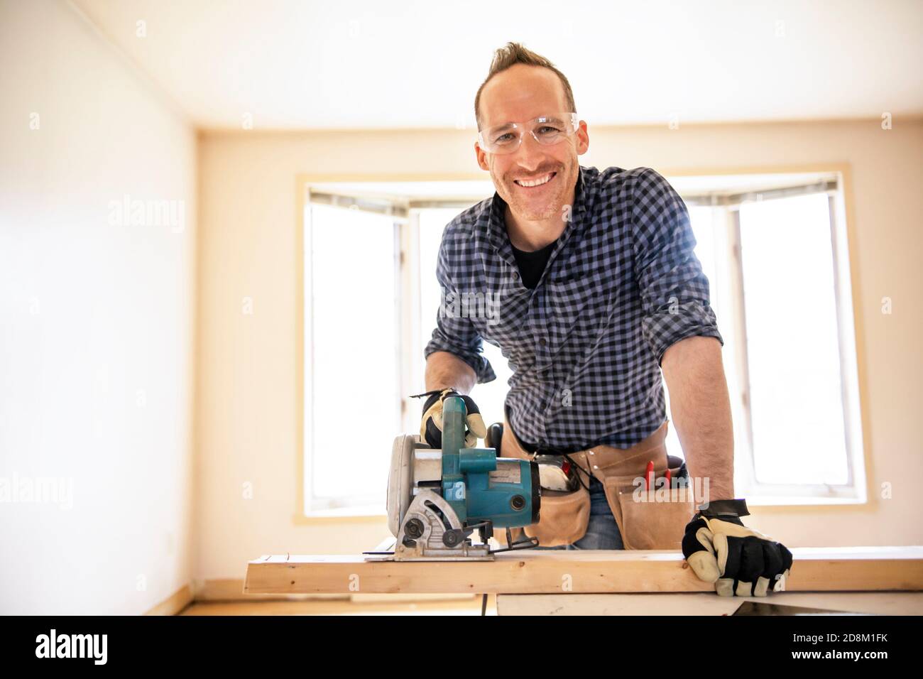 Young man carpenter inside workshop hi-res stock photography and images ...