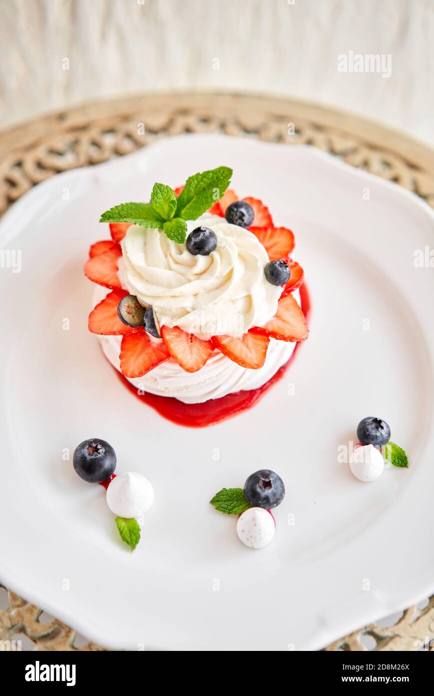 Pavlova is a meringue-based dessert with a crisp crust topped ...