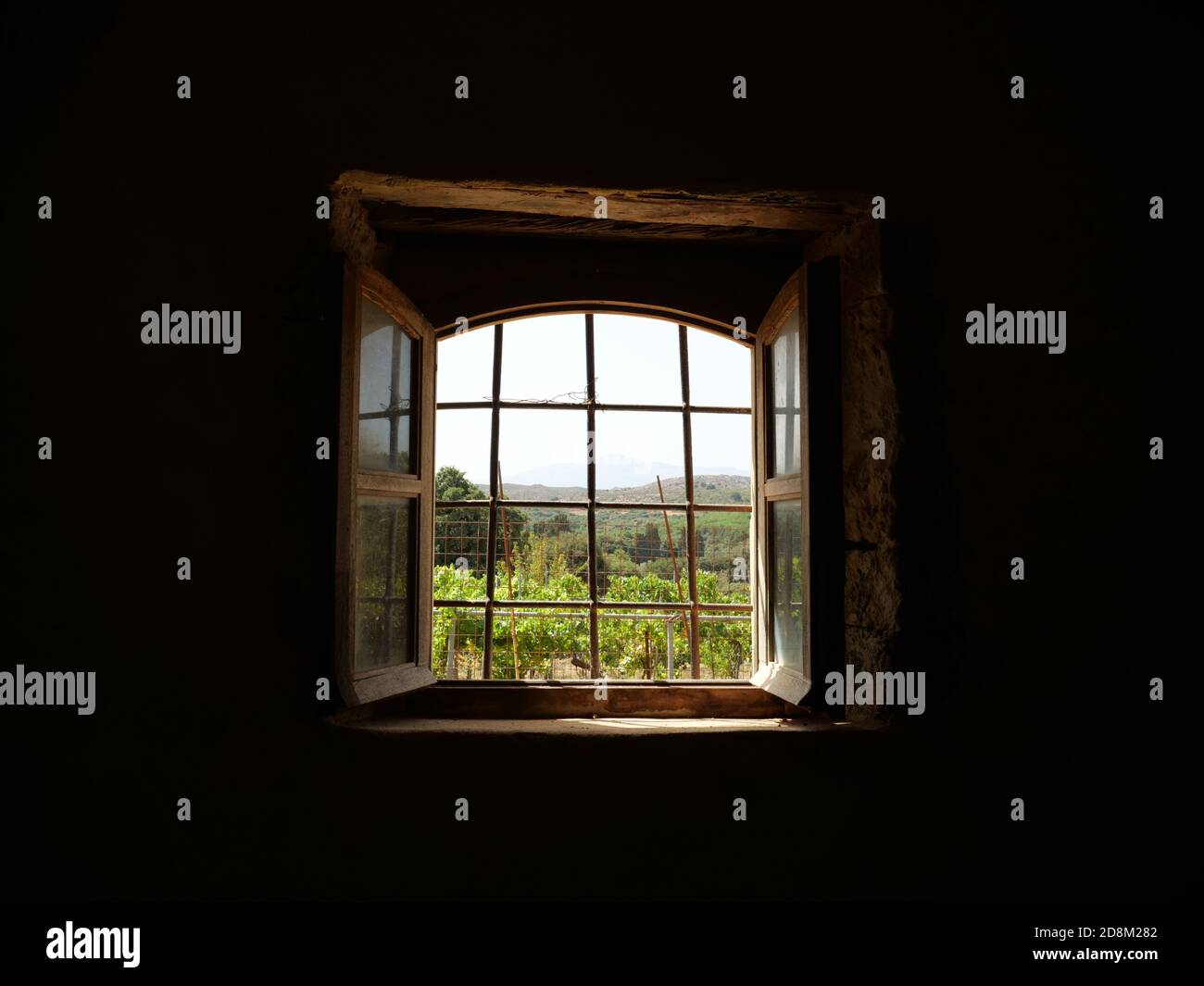 Fields from inside a house's window Stock Photo - Alamy