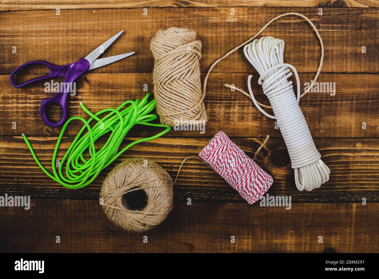 Flat lay of cord selection and scissor Stock Photo - Alamy