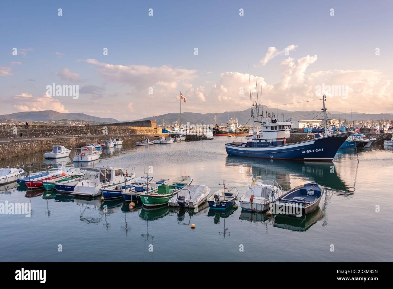 Spain; Sep 2020: Colorful traditional fishing boats belayed at the ...
