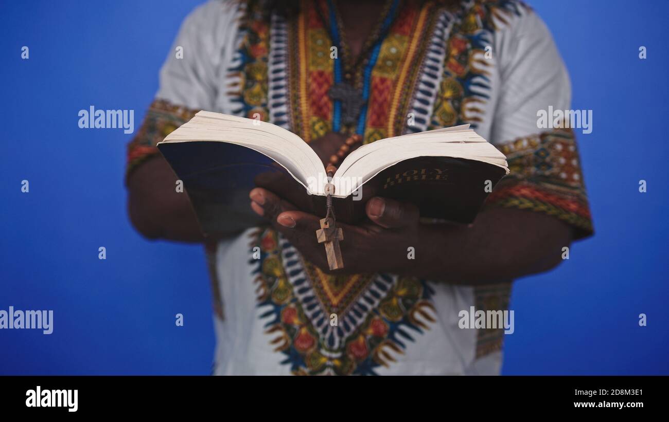 African man reading bible hi-res stock photography and images - Alamy