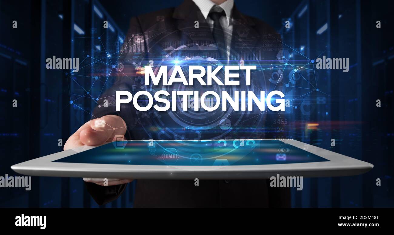 Young business person working on tablet and shows the inscription ...