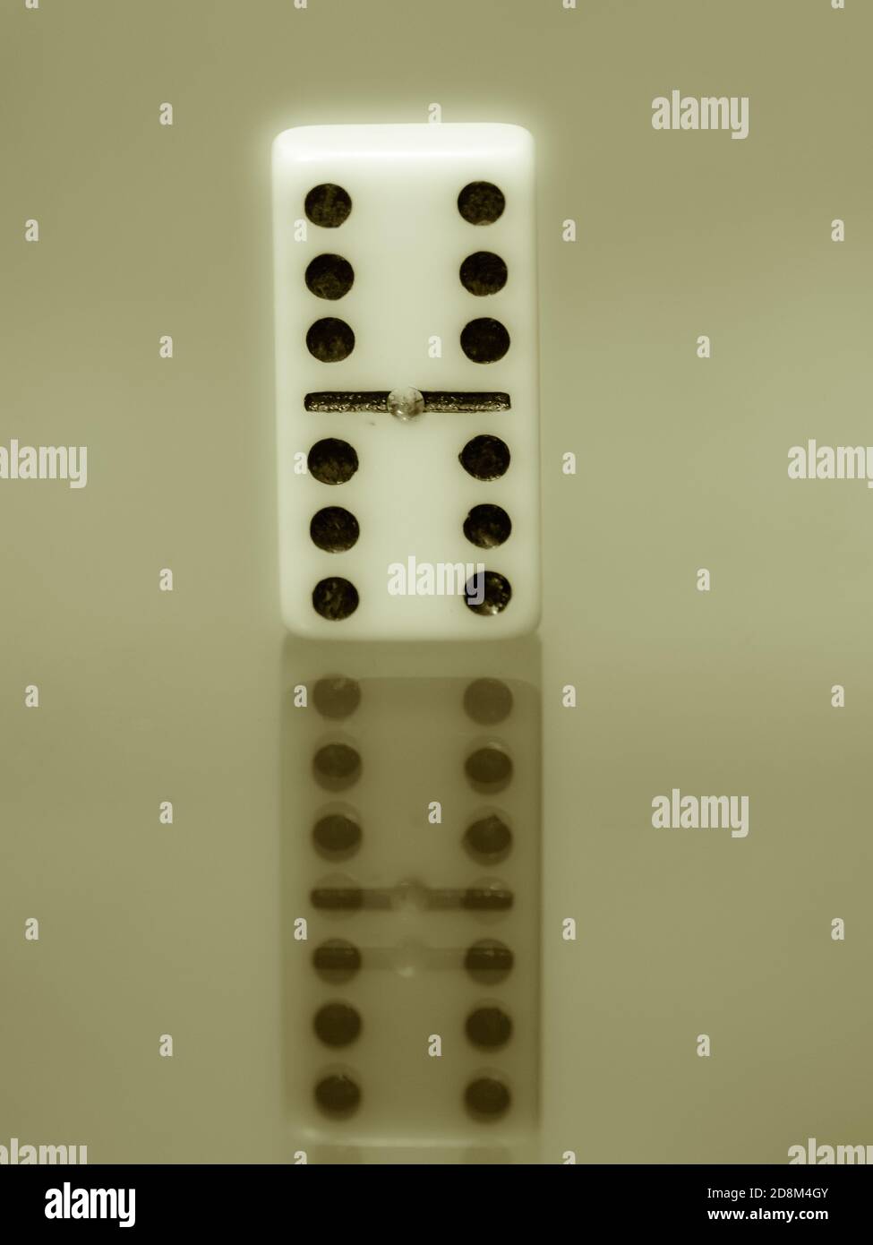 Vertical shot of a white domino tile Stock Photo - Alamy