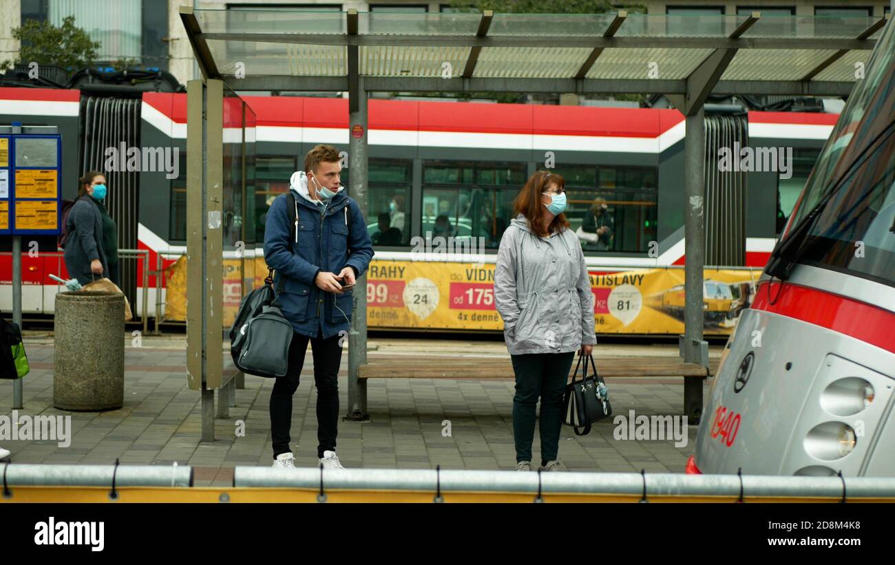 Coronavirus mask without face tram stop tram crowd woman streetcar tram ...
