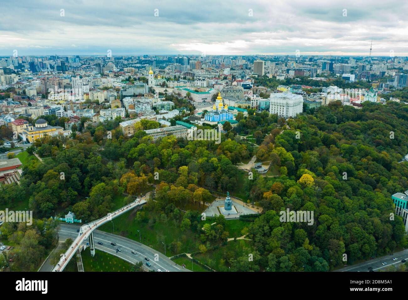 Aerial view of new pedestrian cycling park bridge construction, hills ...