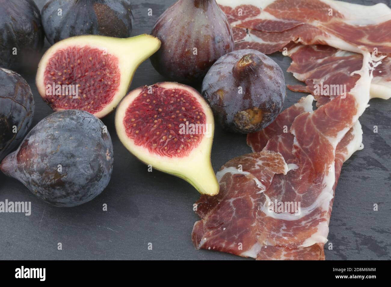 figs with spanish ham as a gourmet delicacy food Stock Photo - Alamy