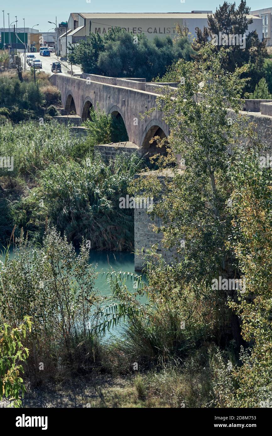 13th century medieval bridge over the river Mijares at the Ermita Santa ...