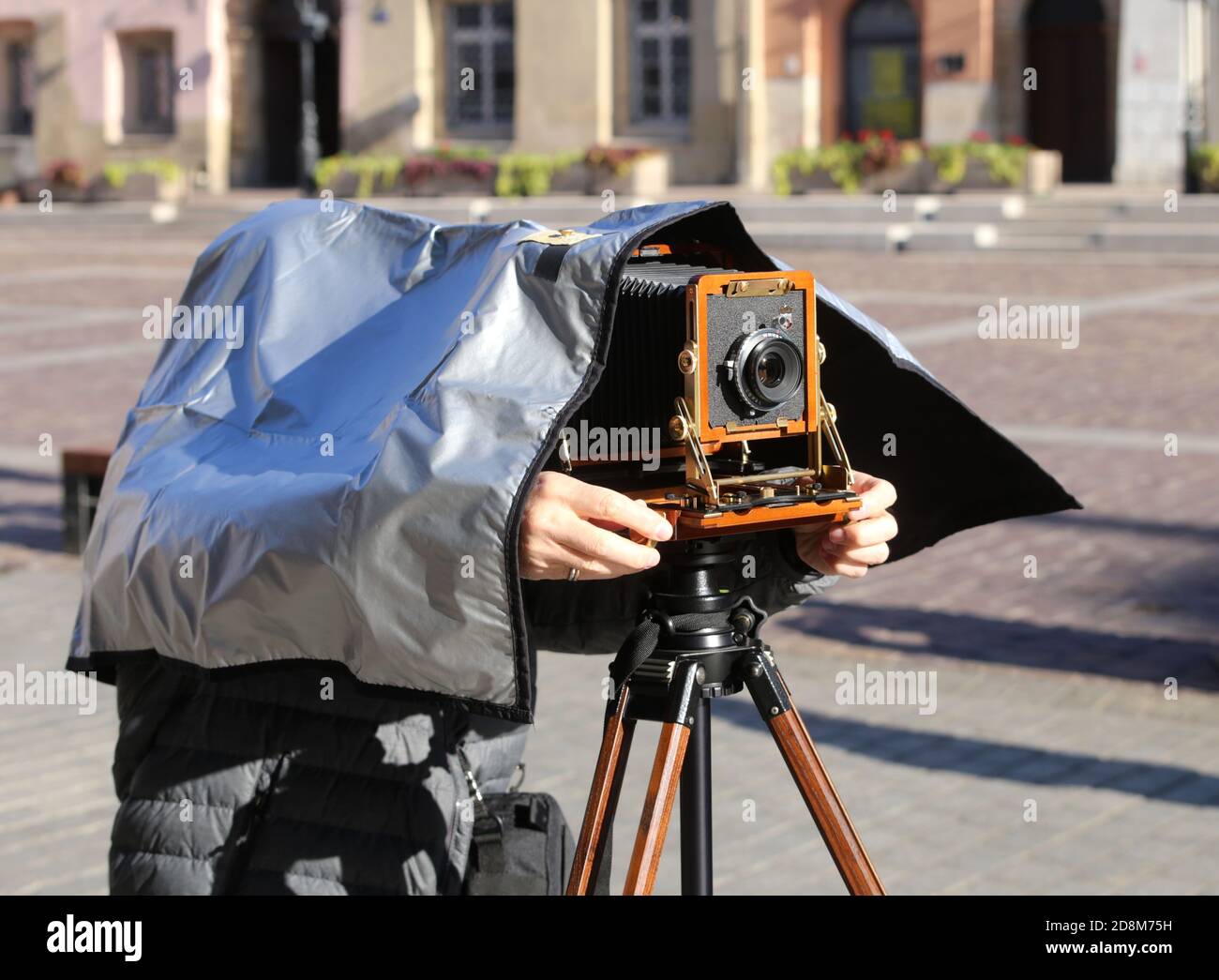Cracow, Malopolska/Poland - 20.10.2020: Photographer taking picture ...