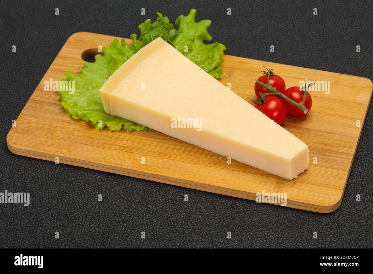 Italian traditional parmesan cheese triangle served salad Stock Photo ...