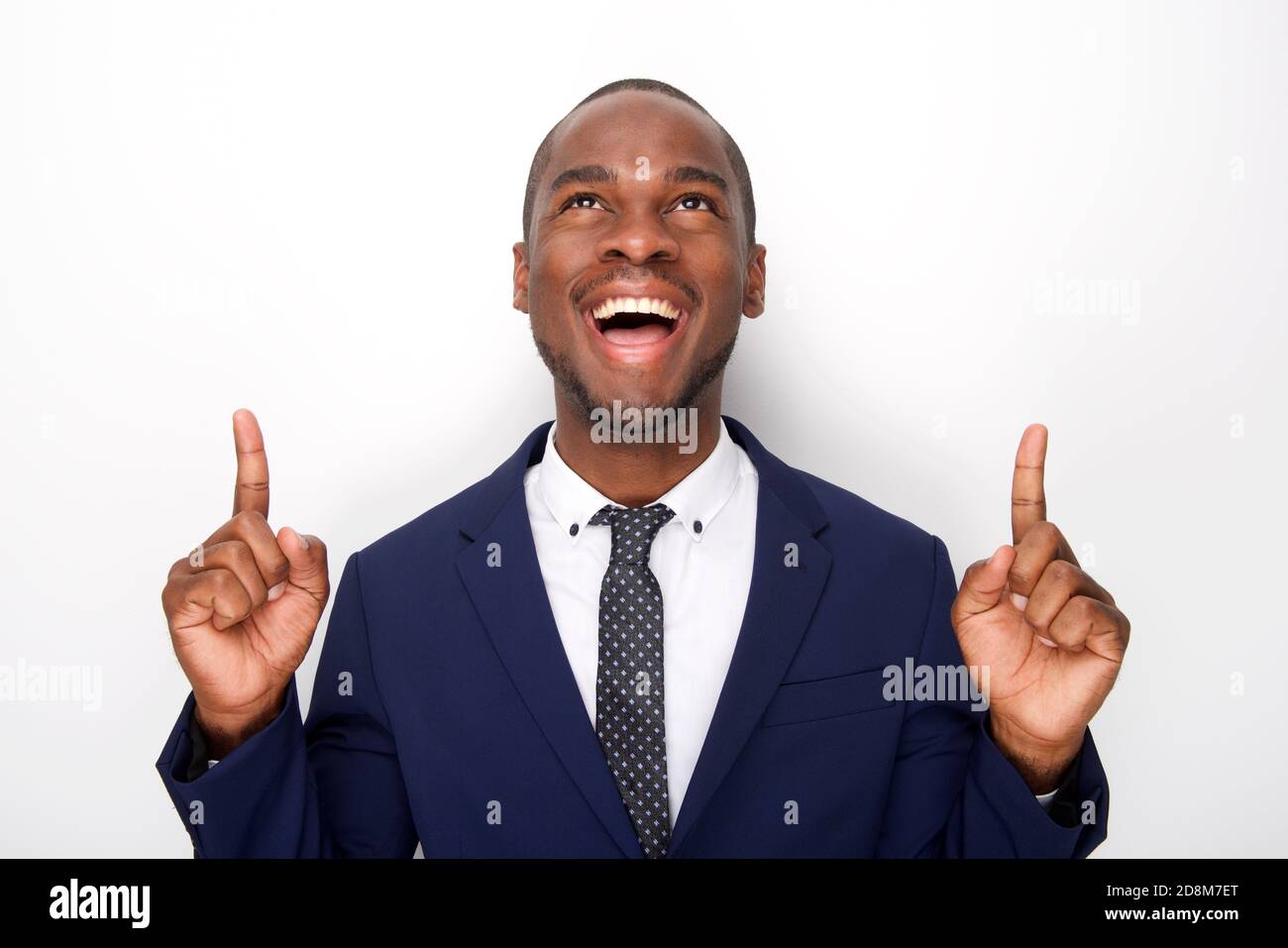 Close up portrait of african american businessman laughing with fingers ...