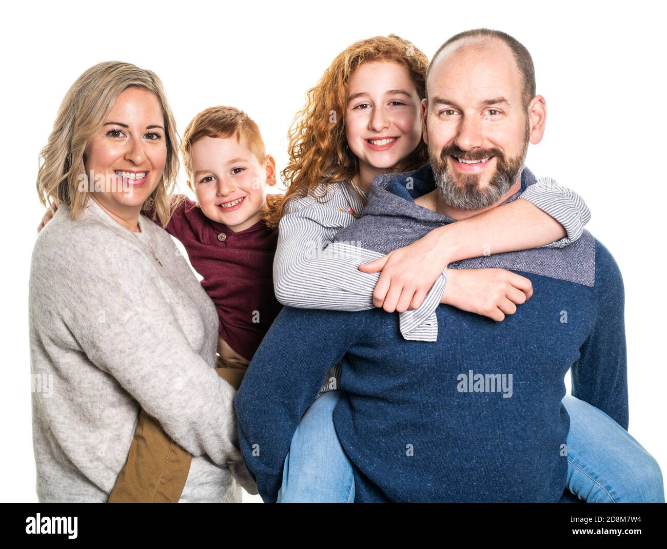 A Beautiful happy family together on studio white background Stock ...