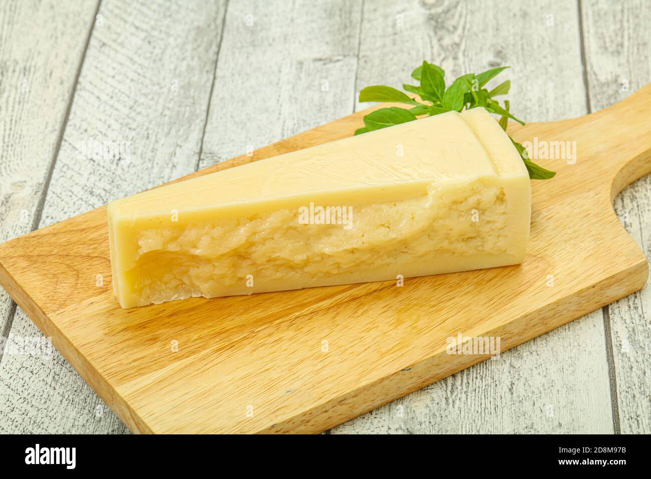 Hard parmesan cheese served basil leaves Stock Photo - Alamy