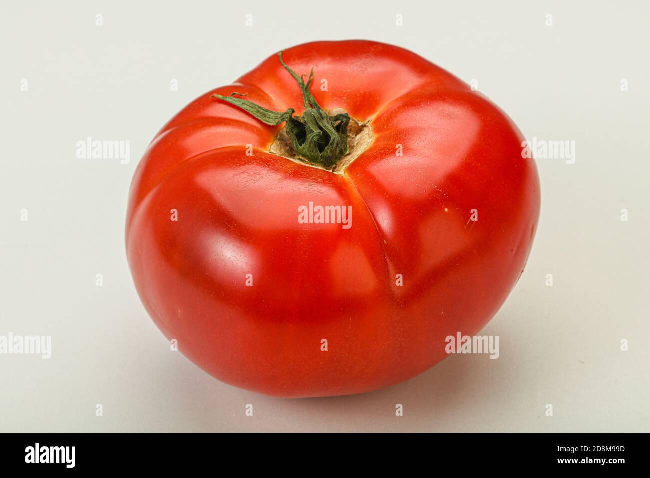 Ripe big juicy red tomato for cooking Stock Photo - Alamy