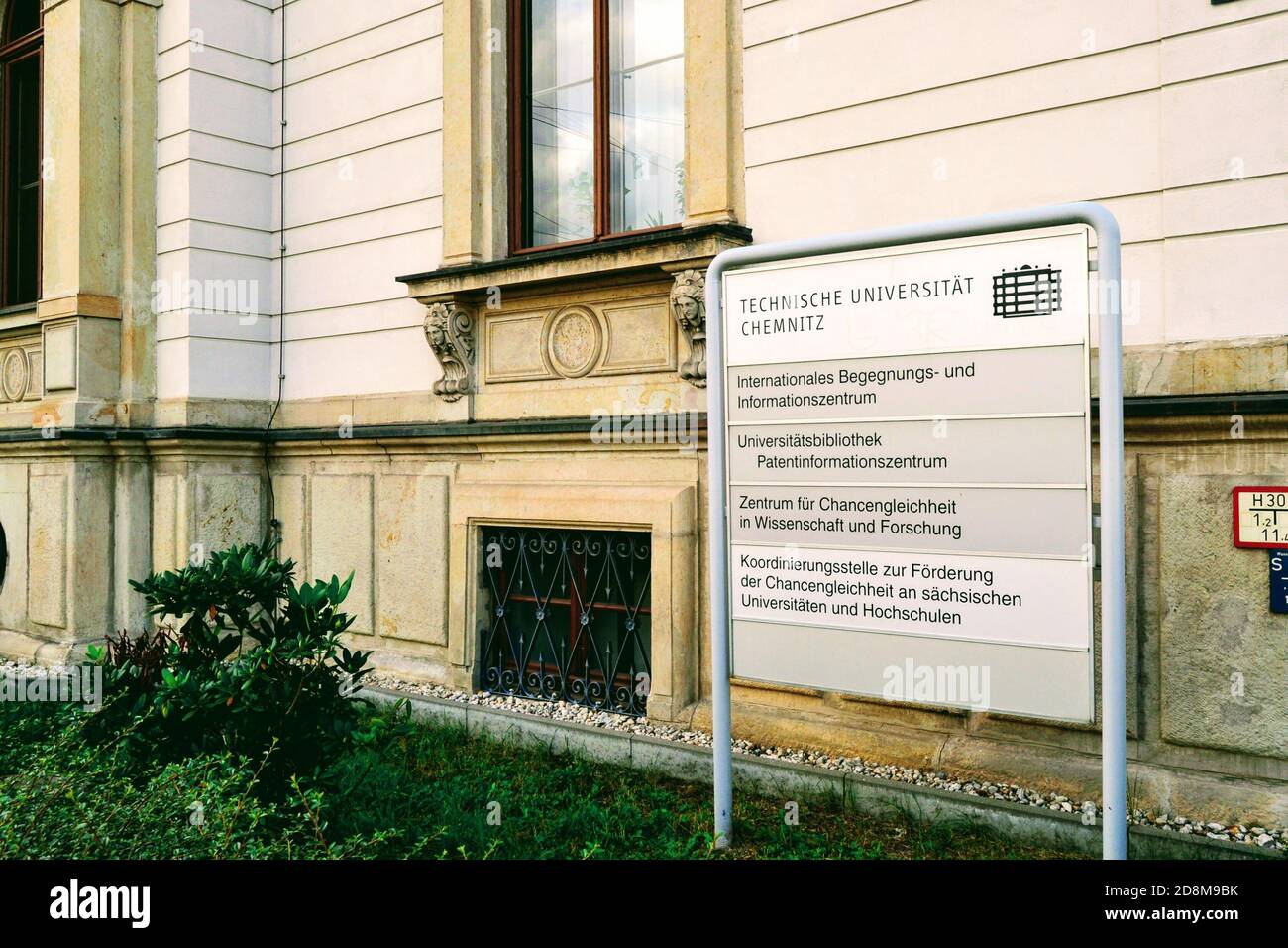 Technical University and its signboard on the grass. Sign and signboard ...