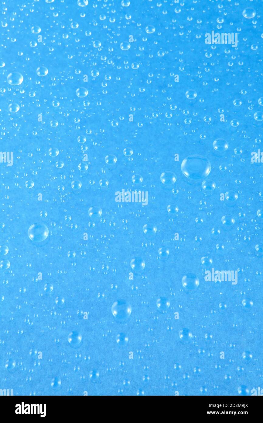 nice water drops- blue background Stock Photo - Alamy