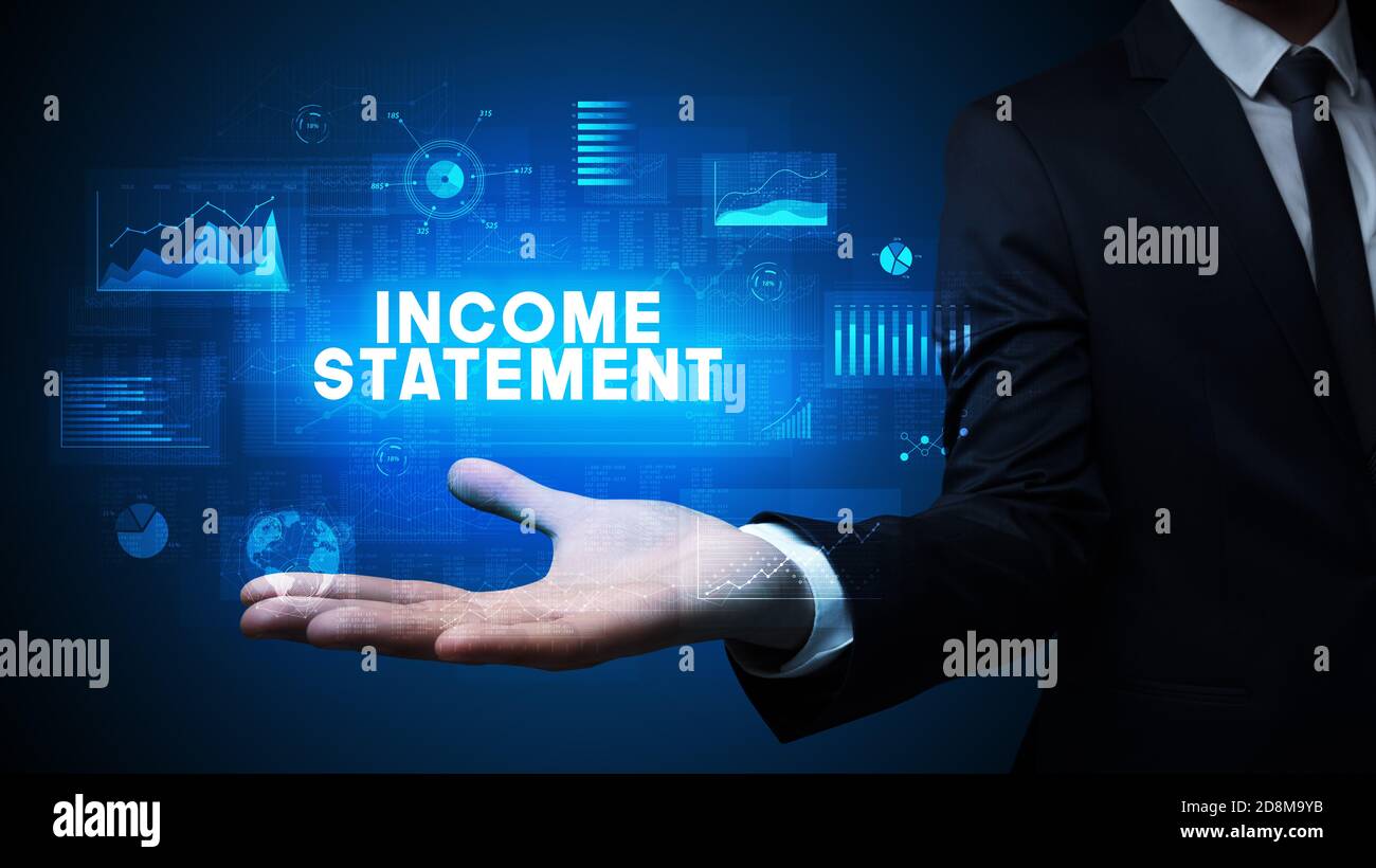 Hand of Businessman holding INCOME STATEMENT inscription, business ...