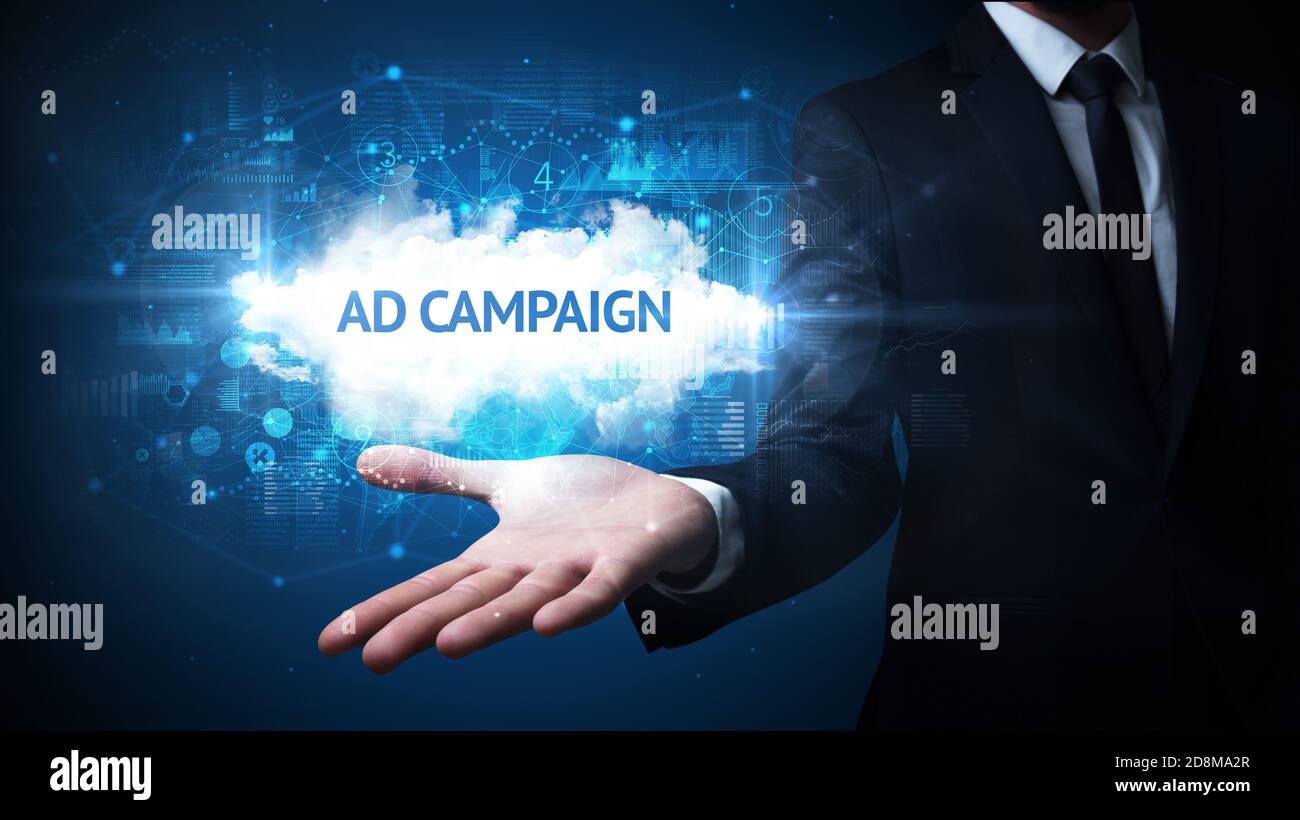 Hand of Businessman holding AD CAMPAIGN inscription, successful ...