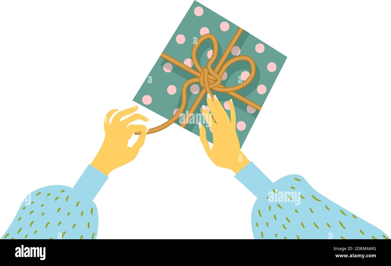 Gift wrapping. Unpacking gifts. Hands holding a box.Trendy Christmas ...