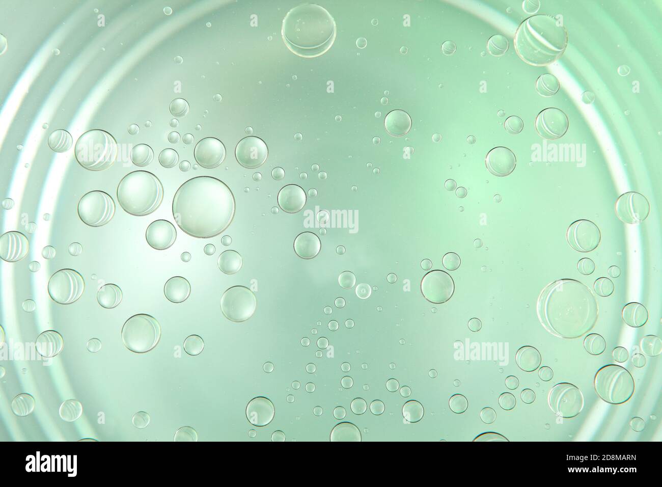 oil floating on colour water-special effect Stock Photo - Alamy