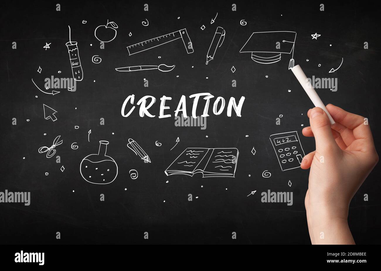 Hand drawing CREATION inscription with white chalk on blackboard ...