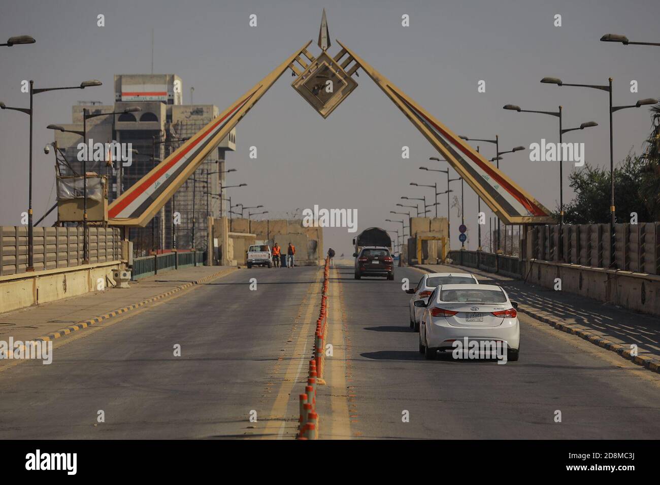 Baghdad, Iraq. 31st Oct, 2020. Cars drive on Al-Jumhuriya Bridge, which ...