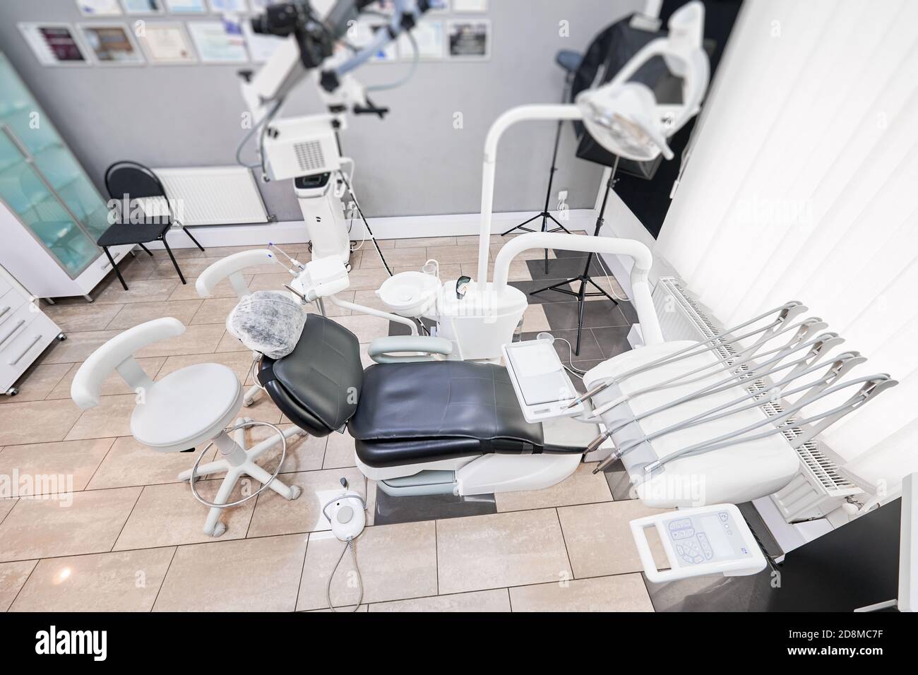 Snapshot of empty clean dental office. Top view on dental chair and ...