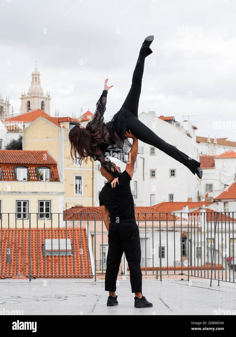 Male and female dancers doing an acrobatic pose Stock Photo - Alamy