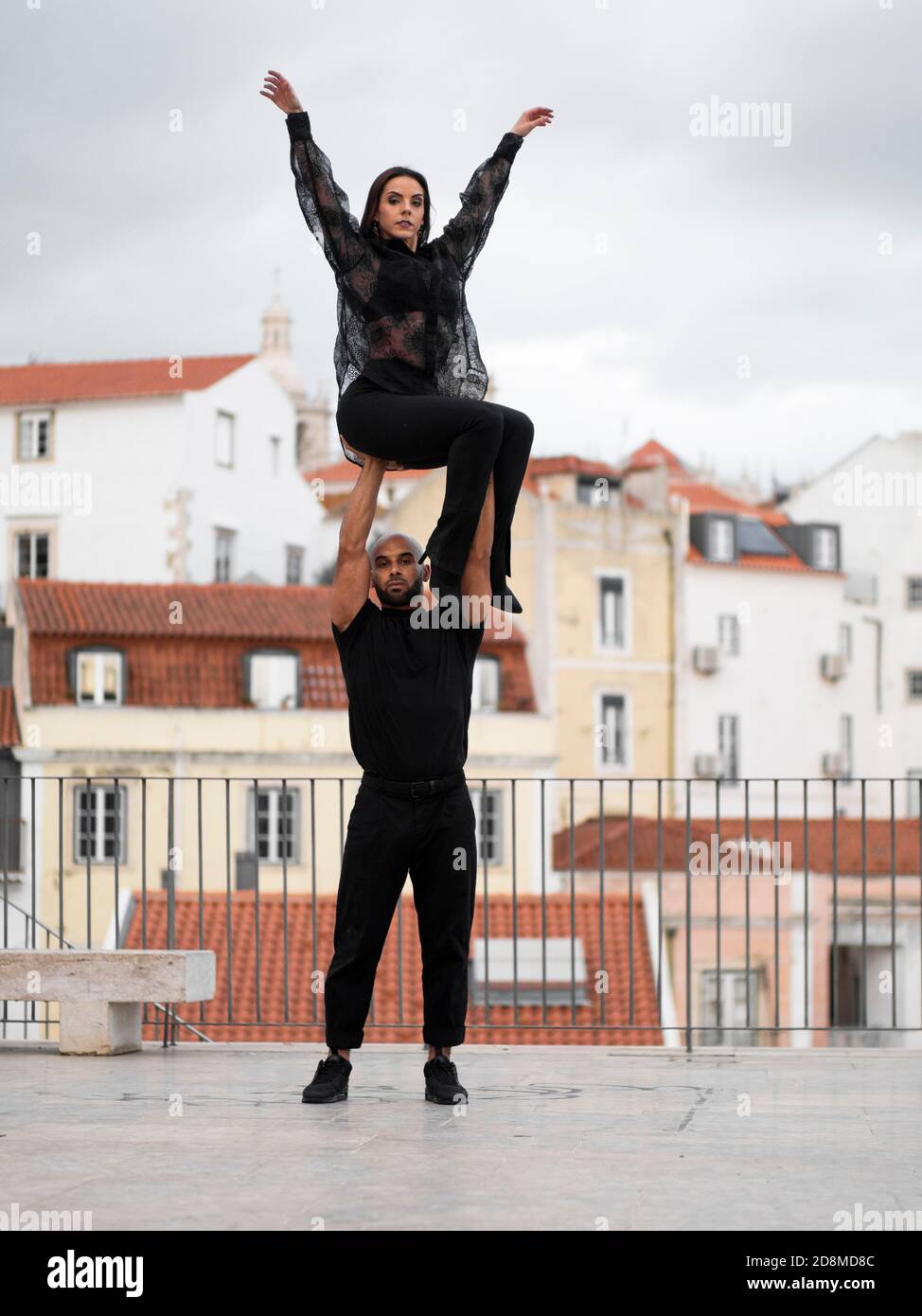 Male and female dancers doing an acrobatic pose Stock Photo - Alamy